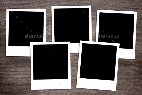 five blank instant photo print templates on wooden background Stock ...