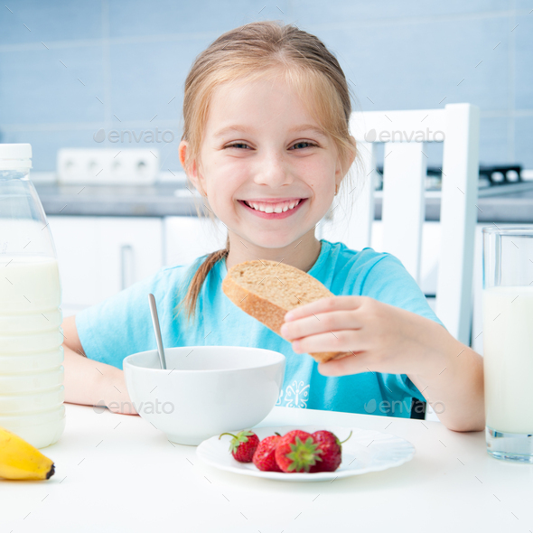 little girl eating Stock Photo by tan4ikk | PhotoDune