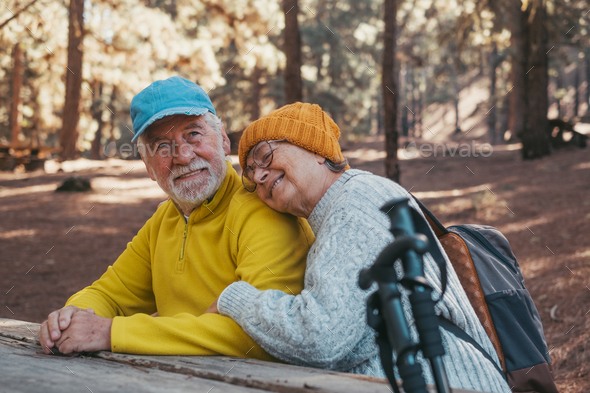 Head shot portrait close up of cute couple of old middle age people having fun and enjoying ...