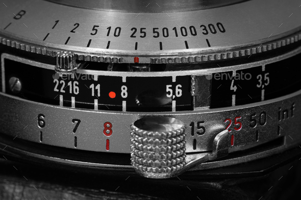 Shutter speed, aperture and focus distance values on a vintage film ...