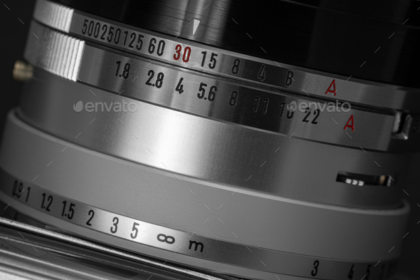 Shutter speed, aperture and focus distance values on a vintage film ...