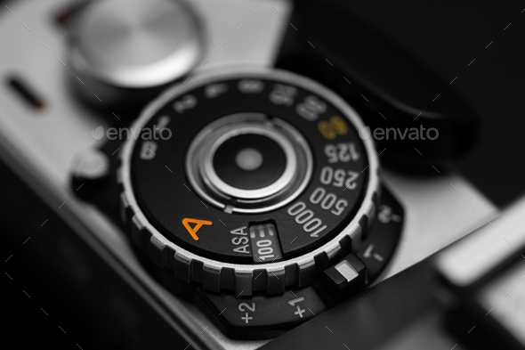 Shutter speed dial with exposure compensation values on a vintage film ...