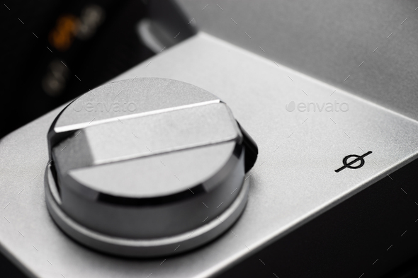 Focal plane mark next to a rewind crank on a retro film camera Stock ...