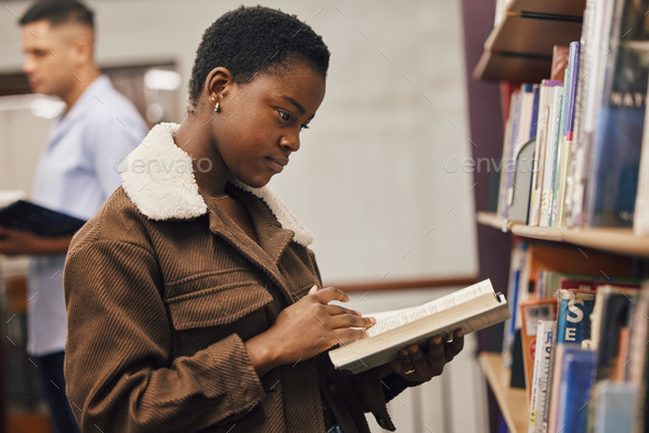 Education, book or black woman reading in library at university ...