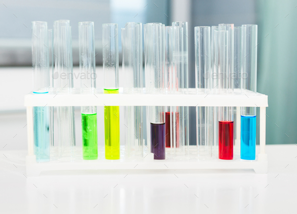 Test glass flask with solution in research laboratory Stock Photo by ...