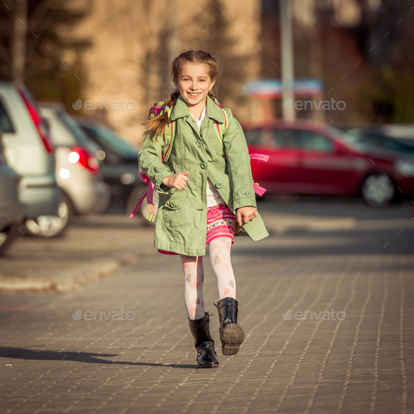 happy little girl running from school Stock Photo by tan4ikk | PhotoDune