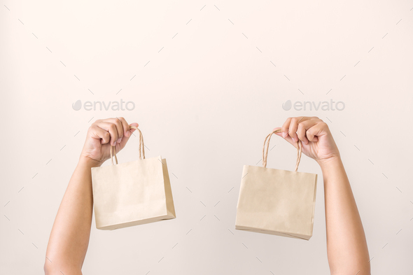 Woman carrying paper bag concept of reuse, recycle the object to zero ...