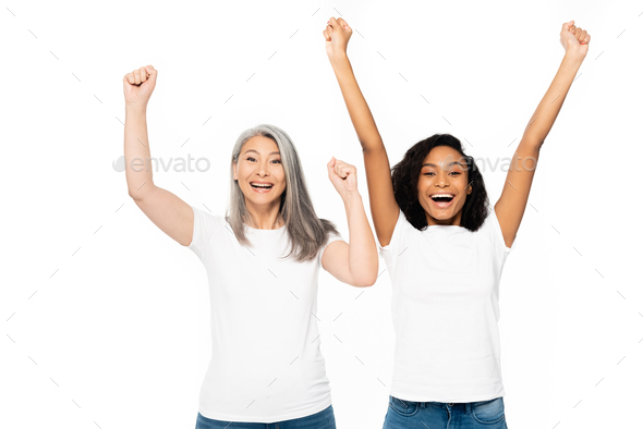 happy multicultural women celebrating triumph isolated on white Stock ...