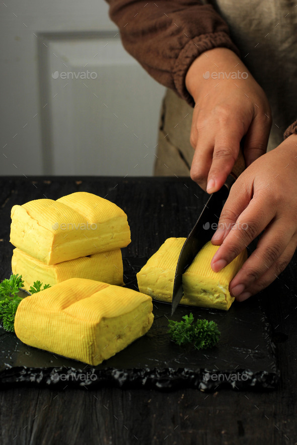 Yellow Tofu Slice using Sharp Knife by Female Chef. Selected Focus Bean ...