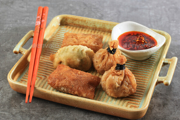 Deep Fried Dim SUm, Ekado, Lumpia on Rustic Square Plate Stock Photo by ...