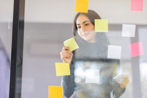 Business female employee with many conflicting priorities arranging ...