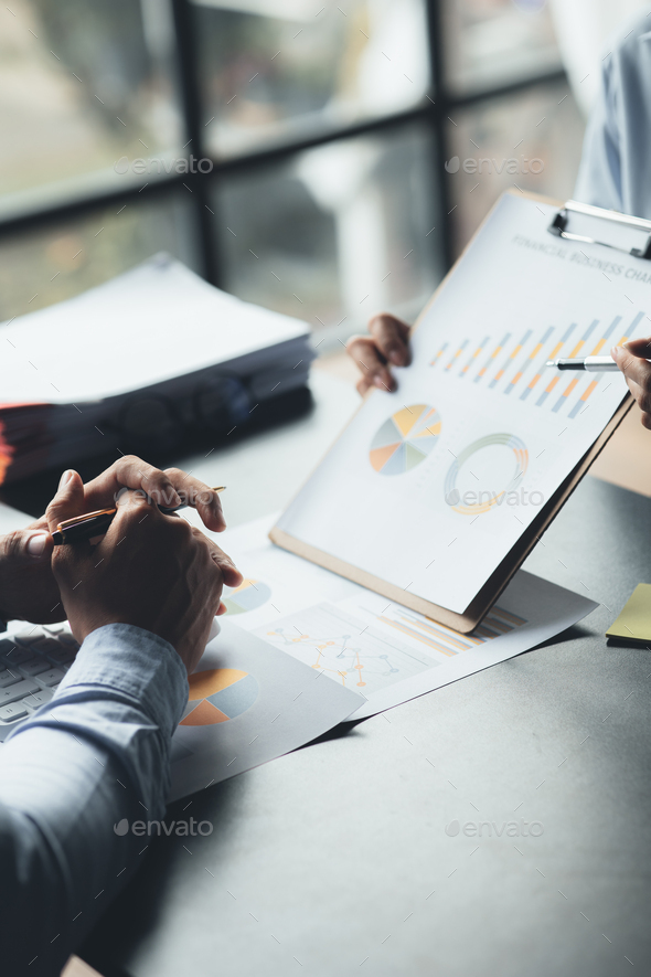 Company meeting room has businessmen and finance managers meeting ...