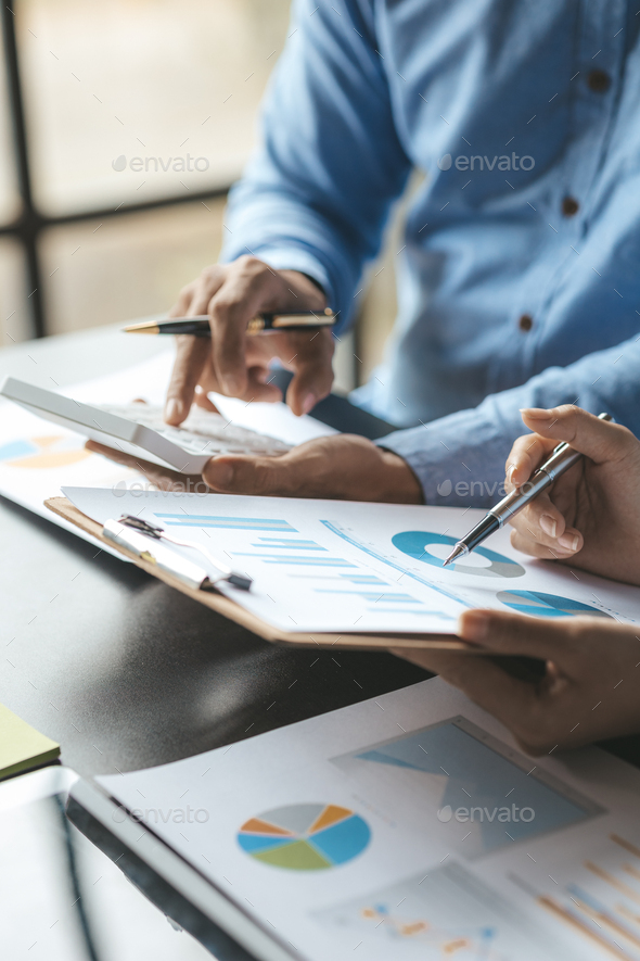 Company meeting room has businessmen and finance managers meeting ...