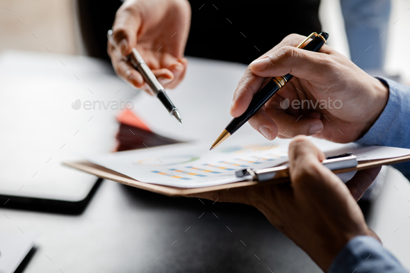 Company meeting room has businessmen and finance managers meeting ...