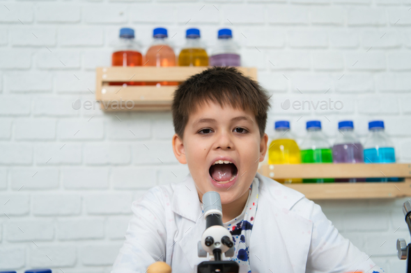 Little boy in science classroom It is the basis for the process of ...