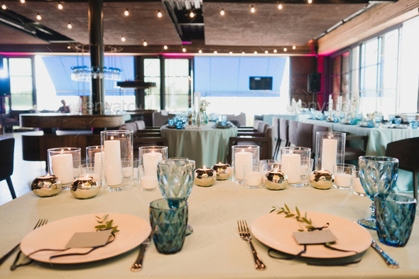 Coziness and style. Modern event design. Table setting at the wedding ...