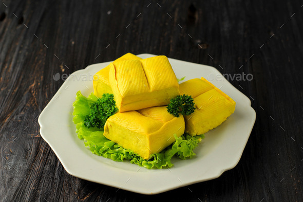 Raw yellow tofu (tahu kuning - Indonesia) is a traditional food of ...