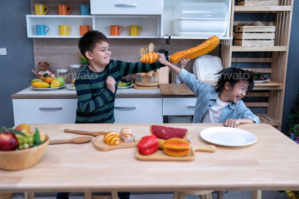 Children in learning kitchen room playing use fake bread and wooden ...