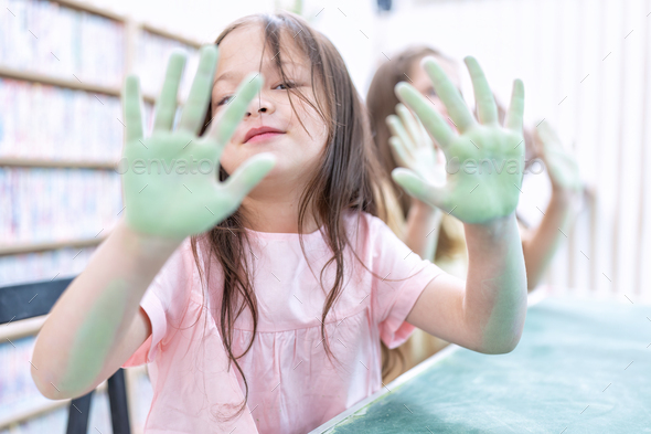 Children in class room happy laughing enjoy chalk drawing on green ...