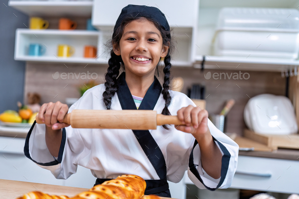 Children in learning kitchen room playing use fake bread and wooden ...