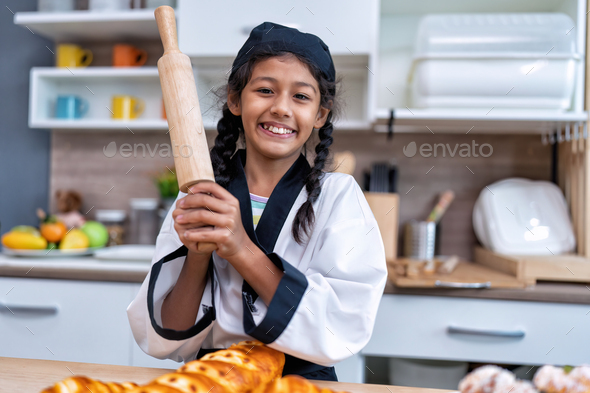 Children in learning kitchen room playing use fake bread and wooden ...