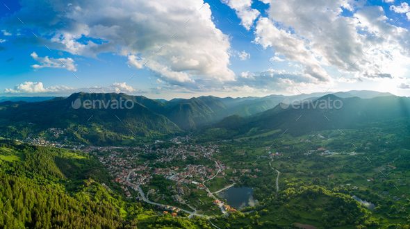 Bulgarian town Smolyan with lake, vegetation and clouds. Rhodope ...