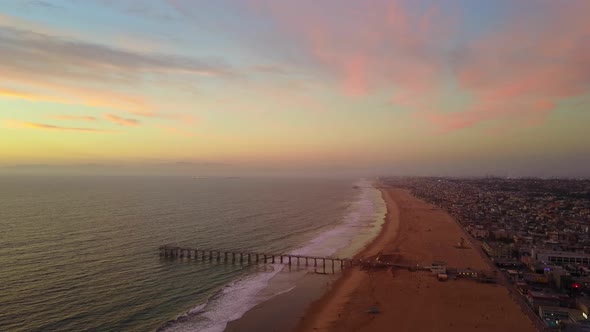 Aerial drone view of a sunset at the beach over the ocean, Stock Footage