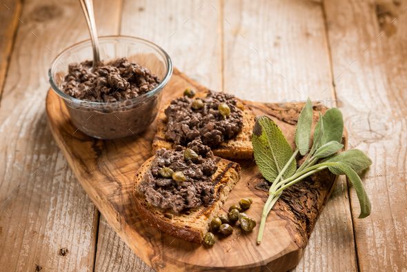 rostini with capers traditional tuscany appetizer Stock Photo by MarcoMayer
