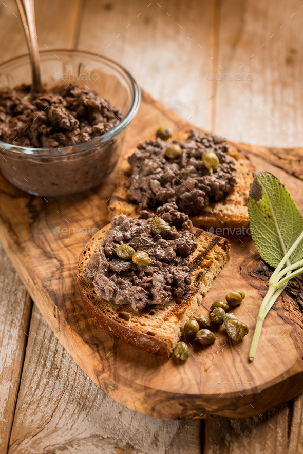 rostini with capers traditional tuscany appetizer Stock Photo by MarcoMayer