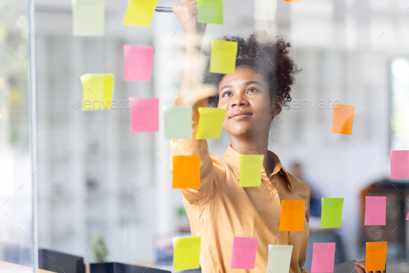 Business female employee with many conflicting priorities arranging ...