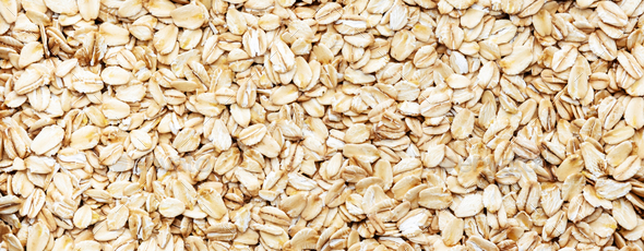 Raw organic oatmeal, food background texture, top view horizontal ...