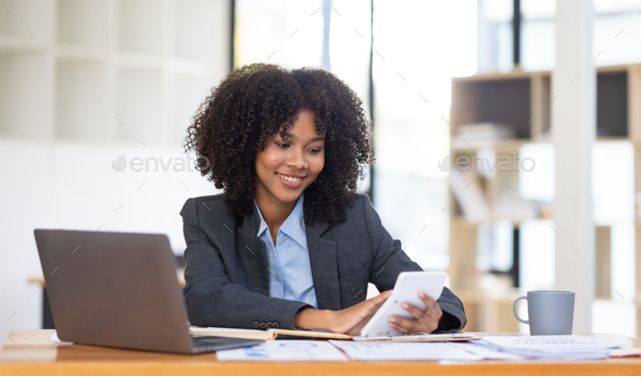 Portrait young african american girl woman working on laptop computer ...