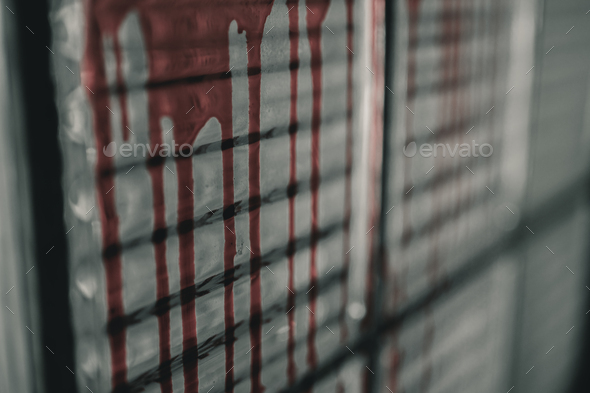 A glass wall stained with blood, Halloween murder concept. Stock Photo ...