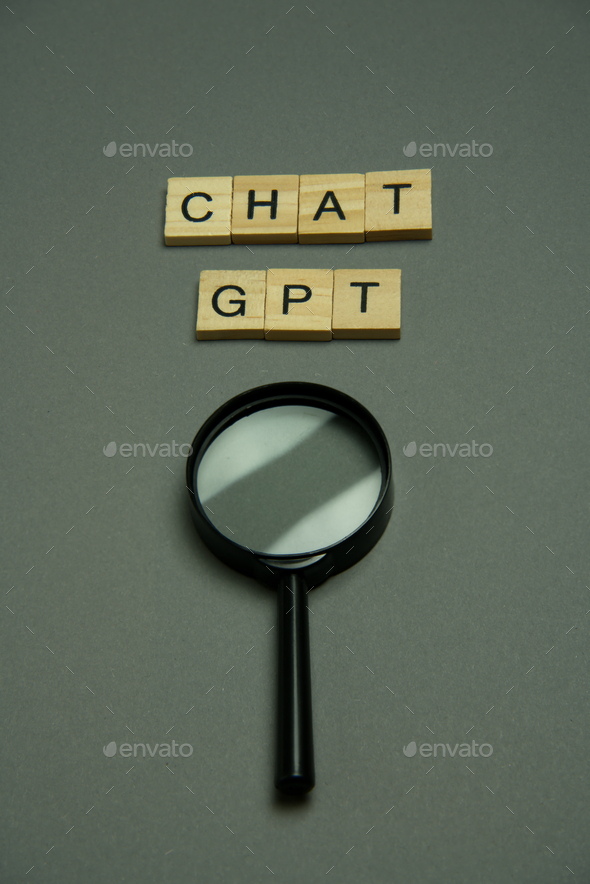 Chat GTP written in wooden letters and a magnifying glass. Stock Photo ...
