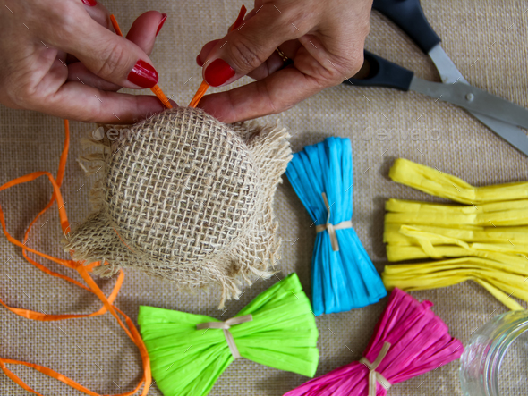 Overhead View of Woman Crafting Making spring gifts with colorful ...