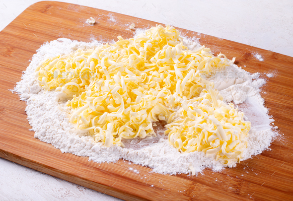 Frozen grated butter and flour. Making chopped dough or quick puff ...