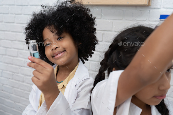 Elementary School Science student have fun playing biochemistry ...