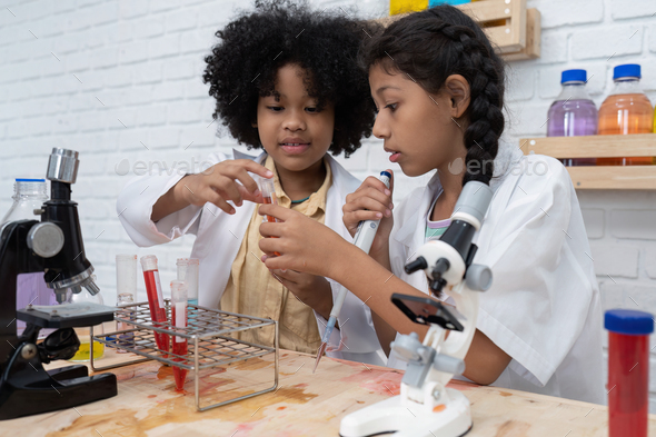 Elementary School Science student have fun playing biochemistry ...