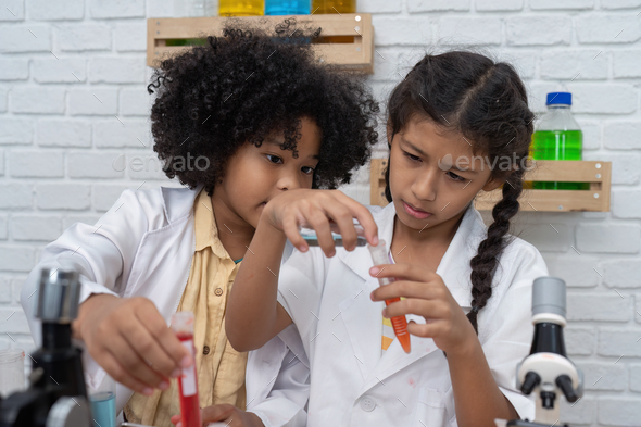 Elementary School Science student have fun playing biochemistry ...
