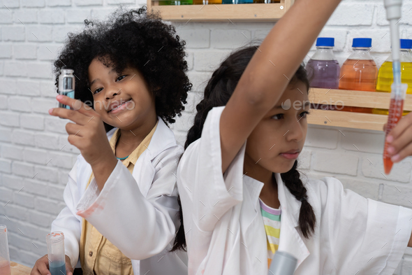 Elementary School Science student have fun playing biochemistry ...