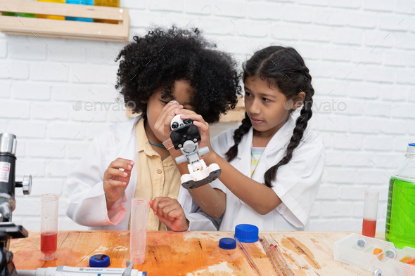 Elementary School Science student have fun playing biochemistry ...
