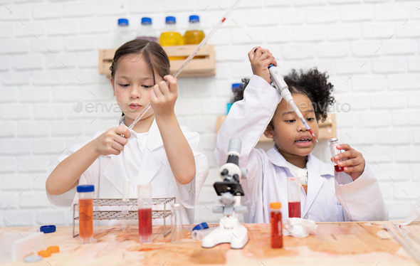 Elementary School Science student have fun playing biochemistry ...