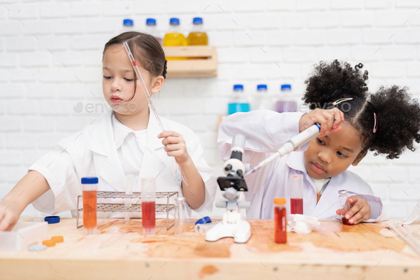 Elementary School Science student have fun playing biochemistry ...
