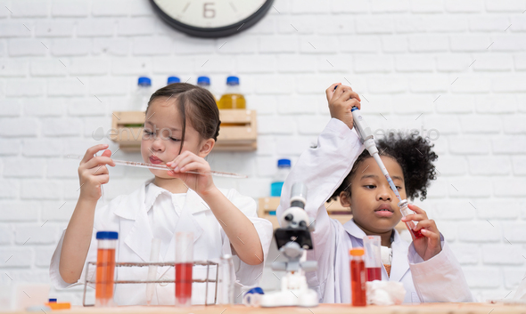 Elementary School Science student have fun playing biochemistry ...