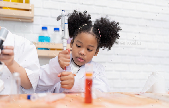 Elementary School Science student have fun playing biochemistry ...