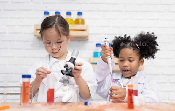 Elementary School Science student have fun playing biochemistry ...