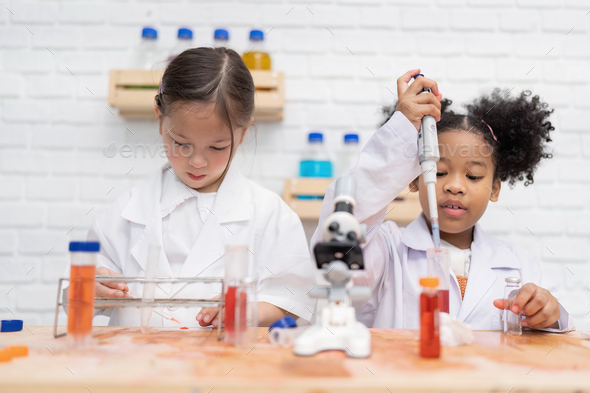 Elementary School Science student have fun playing biochemistry ...