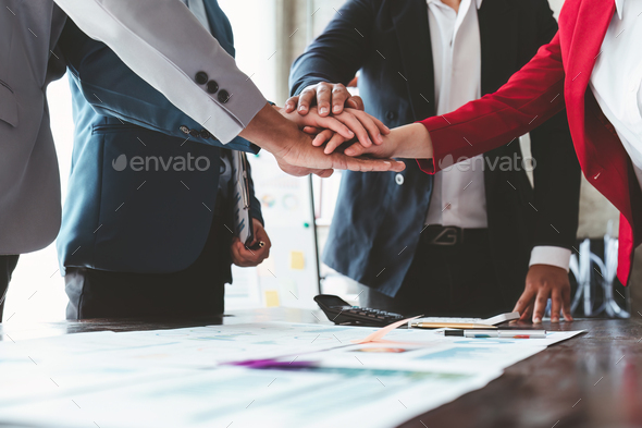 Close up Asian Business people stack of hands working together ...