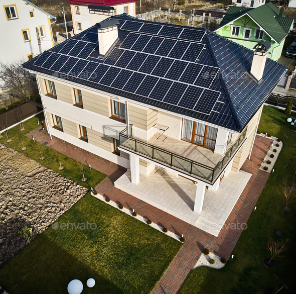 Residential house with solar panel modules on rooftop. Stock Photo by ...