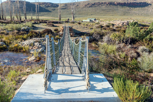 Pedestrian bridge over the Krom River at Kromrivier Cederberg Park ...